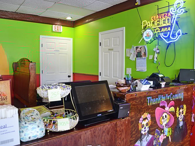 The front counter's vibrant colors and neon signs promise the kind of authentic experience that food dreams are made of.