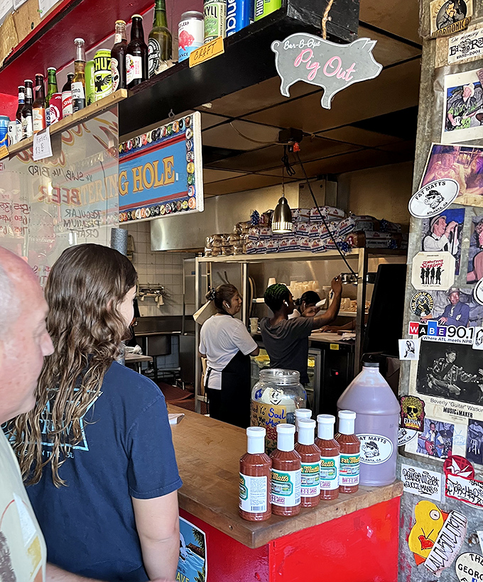 The kitchen window offers a glimpse into barbecue alchemy, where smoke, time, and secret spices transform the ordinary into the extraordinary.