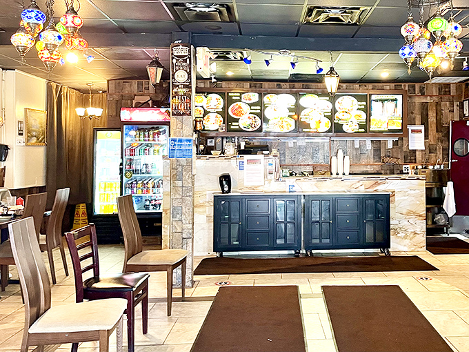The command center of culinary magic. Colorful menu boards and pendant lights create an atmosphere that's both exotic and comfortingly familiar.