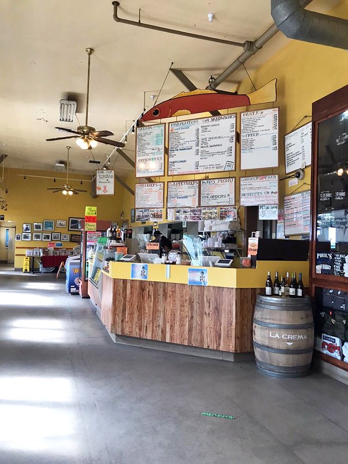 The ordering counter—where dreams of seafood feasts begin and difficult decisions must be made. Choose wisely, my friends.