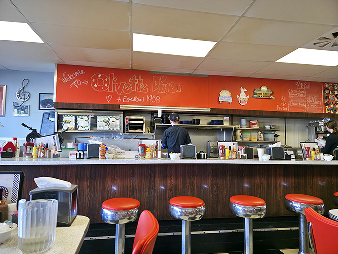 "Welcome to Olivette Diner, established 1958" proclaims the cheerful sign above the grill - a declaration of six decades of breakfast devotion.