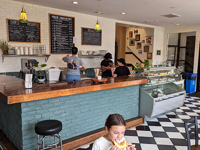 The turquoise counter adds a pop of color to the classic deli aesthetic. Like Miami Beach met Manhattan and they decided to serve sandwiches.