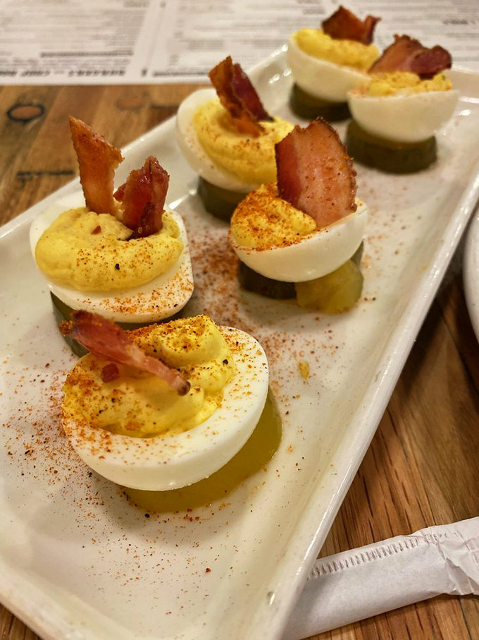 Deviled eggs topped with bacon&mdash;because sometimes the road to heaven is paved with devilishly good intentions and smoked pork.