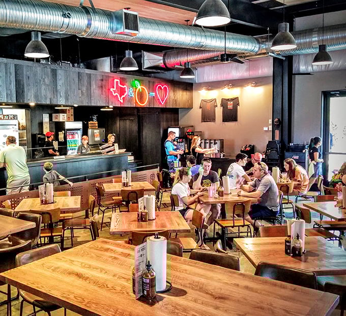 The buzz of conversation mingles with the aroma of smoke. Every table tells a story of carnivorous delight and newfound barbecue devotion.