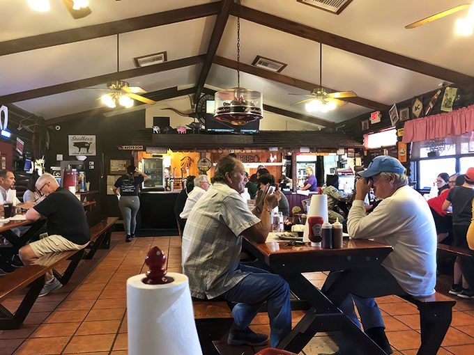 The dining room buzzes with the satisfied murmurs of barbecue enthusiasts. Notice how nobody's looking at their phones? That's the power of great food.