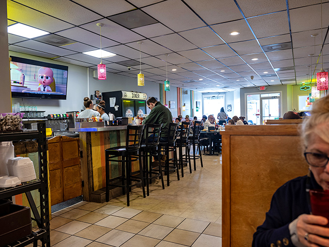The dining room hums with conversation and coffee refills&mdash;a community gathering spot where strangers become neighbors over pie.