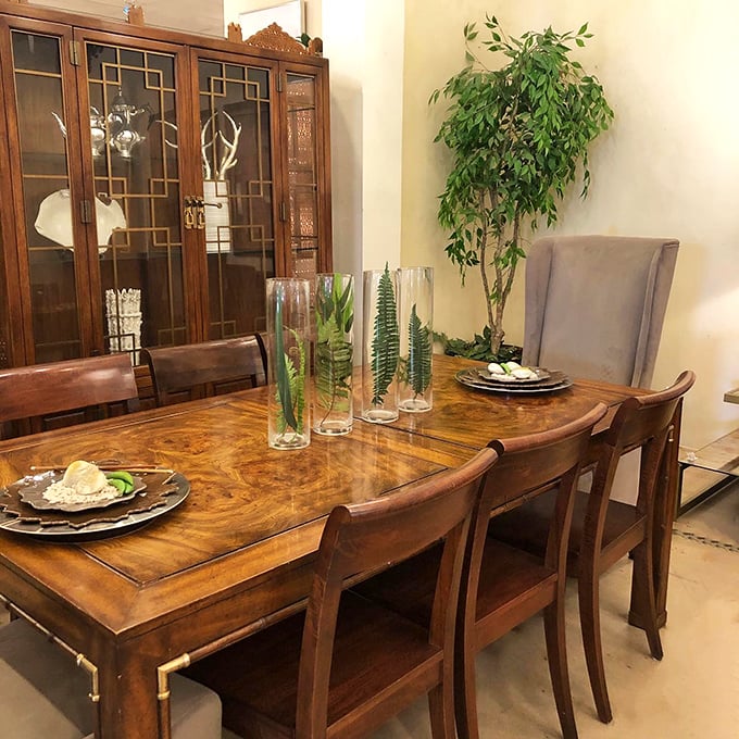 This dining table's rich burl wood grain tells stories of feasts past and future. The perfect setting for conversations that linger long after dessert.