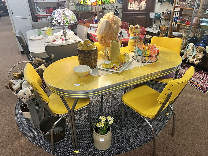 That sunny yellow dinette set screams 1950s optimism so loudly you can almost hear "Rock Around the Clock" playing on a tabletop jukebox.