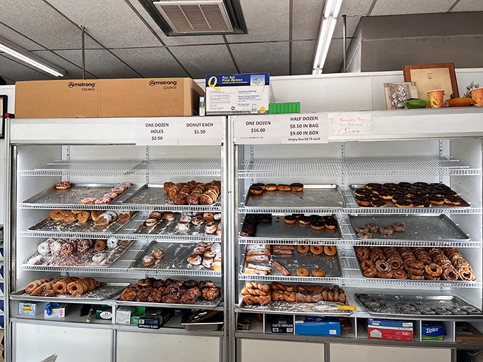 The display case at 8:30 AM &ndash; still impressively stocked but showing battle scars from the dawn patrol of early risers who know the score.