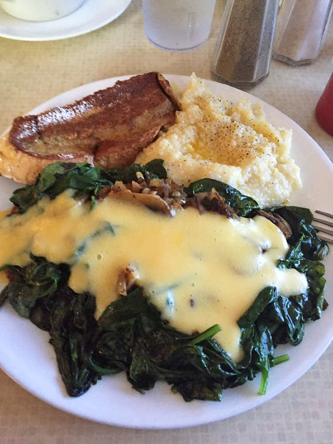 Eggs Florentine that would make Florence proud. Hollandaise sauce cascading over spinach like a creamy yellow waterfall&mdash;Michelangelo couldn't have sculpted it better.