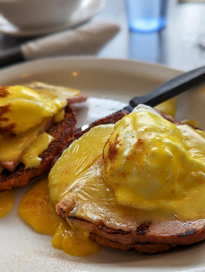 Eggs Benedict that would make a brunch enthusiast weak at the knees. Hollandaise sauce as sunshine on a plate.