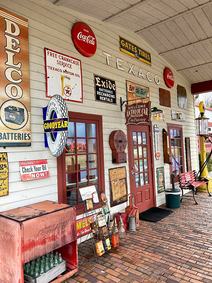 The exterior wall is a time capsule of mid-century advertising, when gas station signs were works of commercial art.