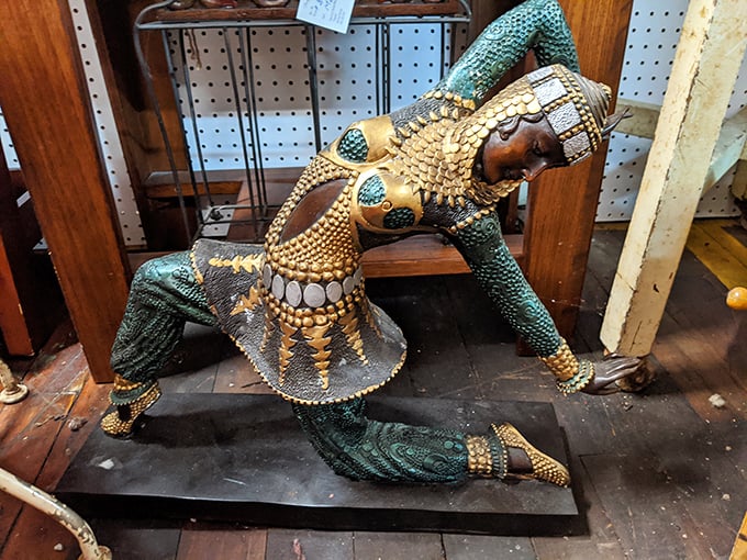 Not your garden-variety statue! This ornate figure embodies the unexpected treasures that make antique hunters' hearts race and wallets open.