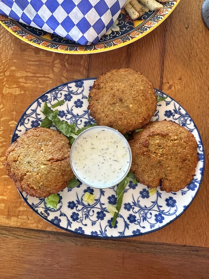 These aren't just any falafel—they're golden-brown orbs of chickpea perfection that could convert even the most dedicated carnivore, at least temporarily.