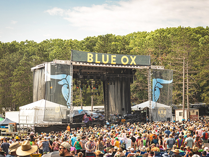 Winter transforms Barstow Street into a twinkling wonderland where snow-dusted trees frame the path to local shops and eateries waiting to warm you up.