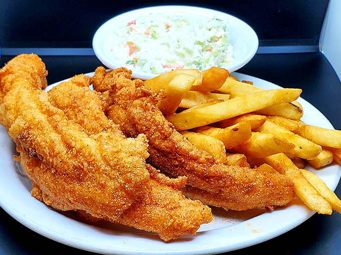 The golden armor on this fish would make King Midas double-take. Crispy, flaky, and served with fries and slaw for the perfect Southern trifecta.
