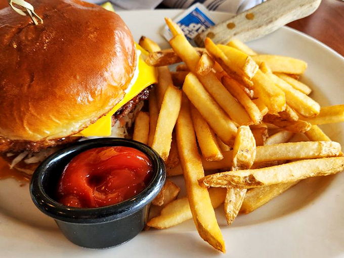 A burger that makes you question why you'd ever order anything else for lunch, with fries so golden they deserve their own Instagram account.