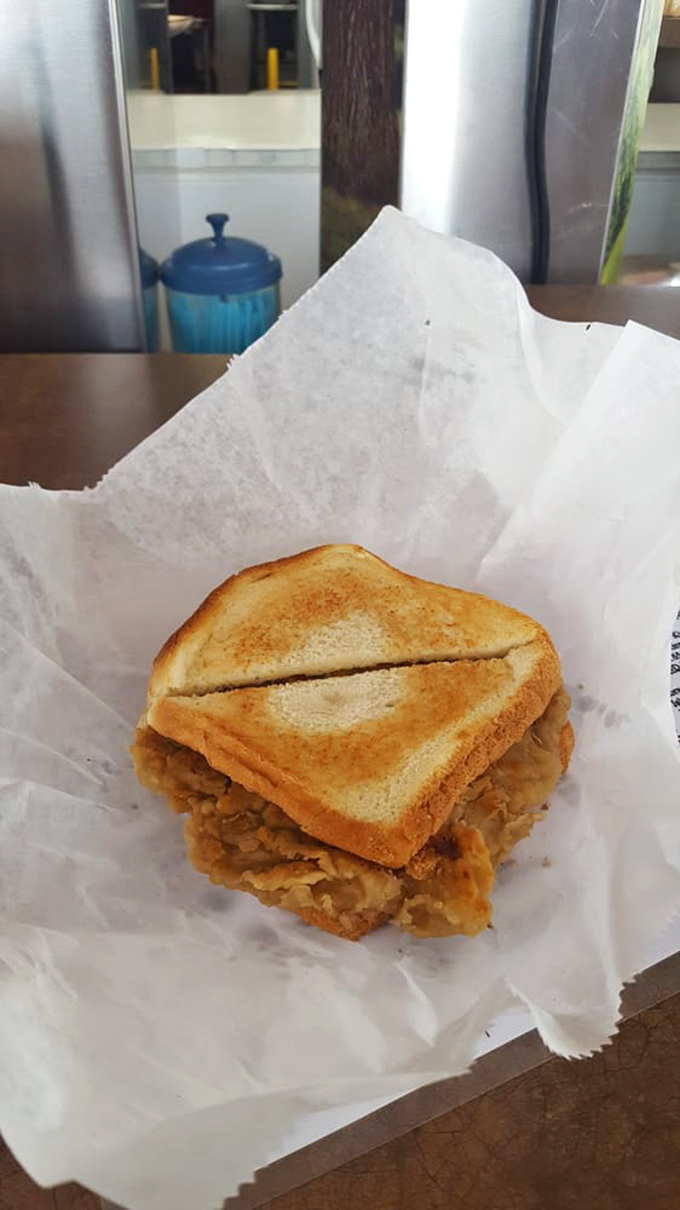 This isn't just a sandwich—it's architectural perfection between two slices of perfectly toasted bread. Comfort food engineering at its finest.