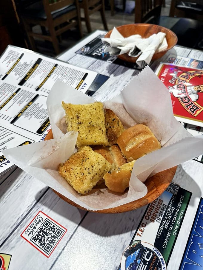 Garlic bread that's both supporting actor and scene-stealer. These buttery, herb-flecked squares are the perfect sauce-sopping vehicles for barbecue adventures.