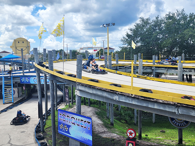 Go-karts wind through elevated tracks, where everyday accountants transform into Formula 1 drivers and family rivalries are settled at 20 mph.