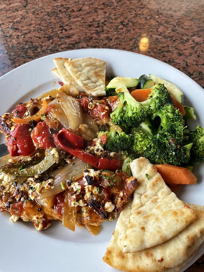 A Greek vegetable medley that proves vegetables can be the main event, not just the opening act. Those pita wedges are perfect dippers.