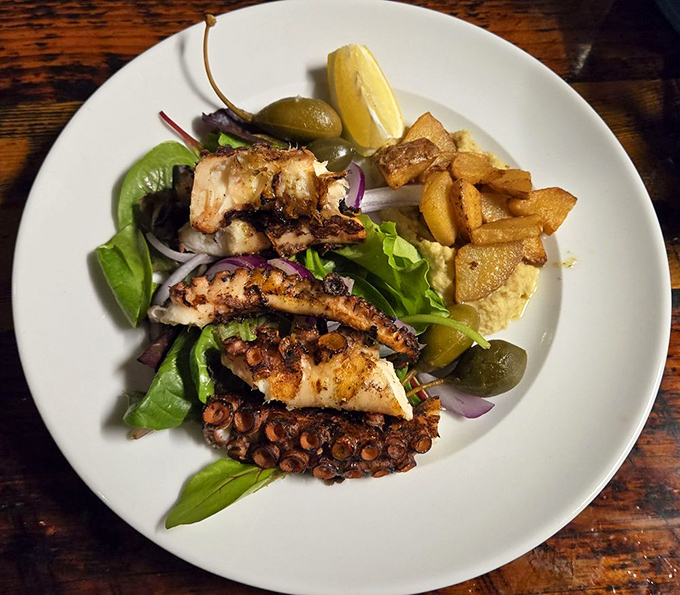 Octopus transformed from intimidating sea creature to culinary masterpiece. Charred to perfection and served with a Mediterranean flair.