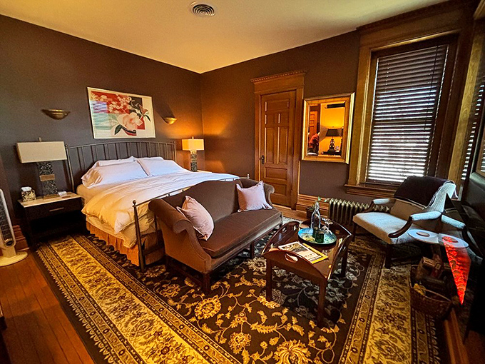 A bedroom that makes hotel rooms look like sad, beige punishment cells. That bed is what clouds aspire to become in their afterlife.