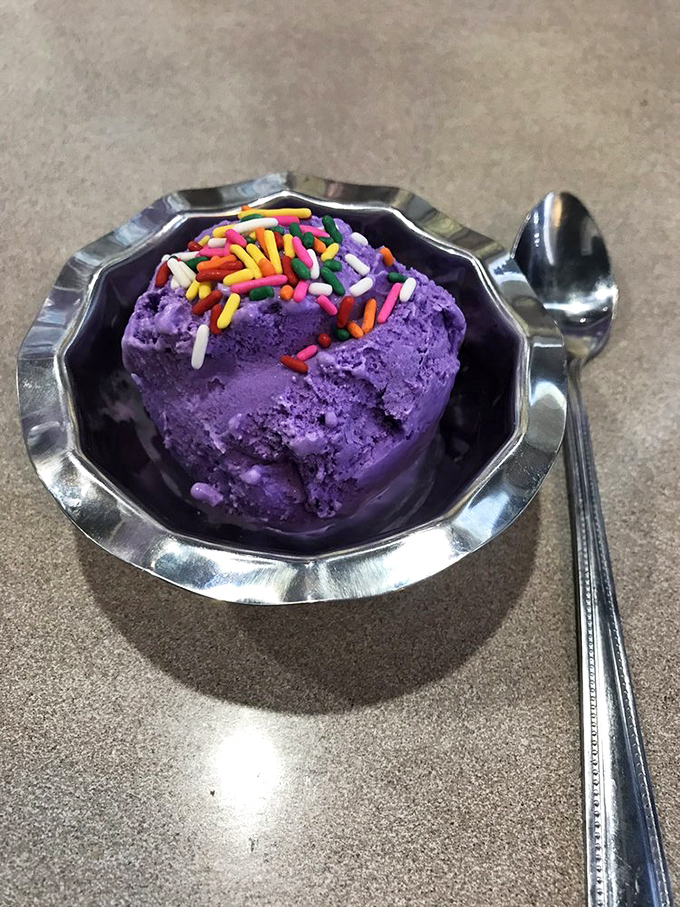 Purple ice cream with rainbow sprinkles&mdash;because sometimes your inner eight-year-old deserves to order dessert for the grown-up you.