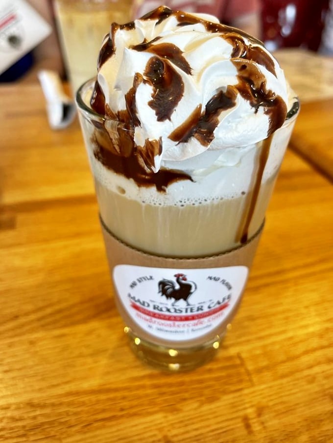 Coffee that's dressed for a special occasion, topped with a cloud of whipped cream and chocolate drizzle worthy of a standing ovation.