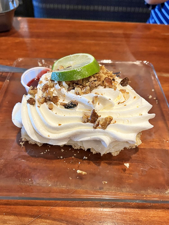 Key lime pie with a cloud of whipped cream and candied nuts. It's the dessert equivalent of a perfect day at the beach.
