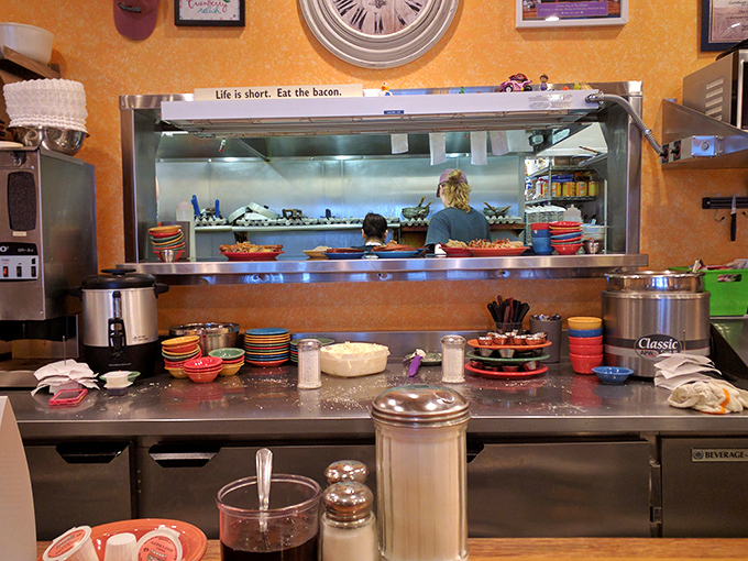 "Life is short. Eat the bacon." Words to live by hanging above the kitchen where breakfast dreams become delicious reality.