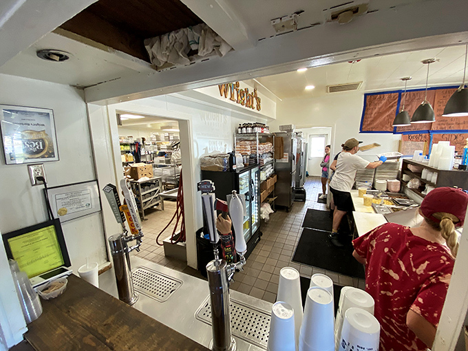A glimpse into the inner sanctum where smoke meets meat. The Wright's team works with the precision of NASA engineers.