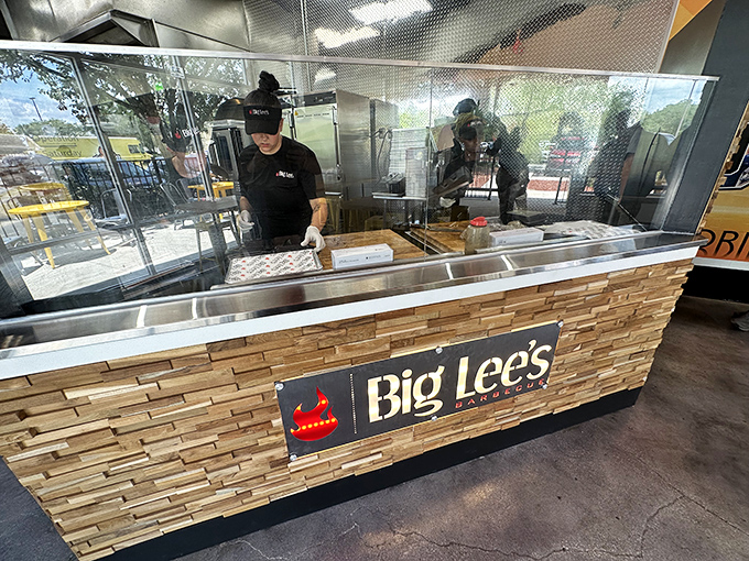 Behind the glass, barbecue magic happens. The counter at Big Lee's is where dreams and hunger meet their match.