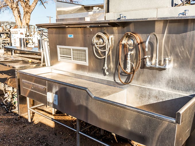 Industrial kitchen sinks that have seen thousands of meals come and go, now waiting for their next culinary home.