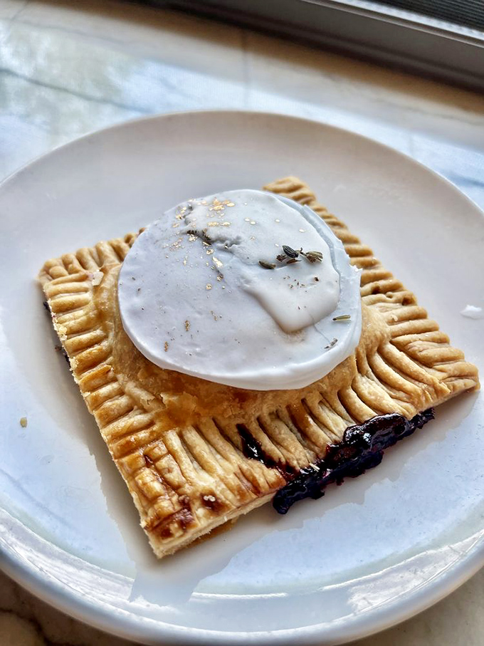 This pastry looks like it should be behind glass at an art museum, not disappearing into my happy stomach.