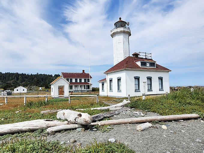 Port Townsend's lighthouse stands sentinel over the water, a postcard-perfect excursion just minutes from your royal accommodations.