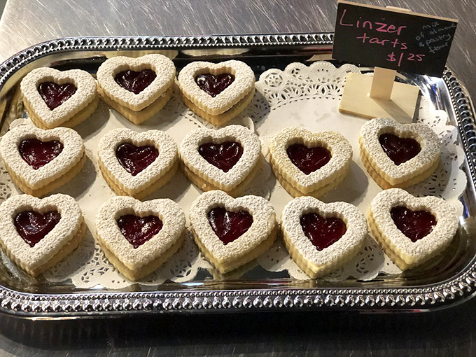 Heart-shaped Linzer tarts that make Valentine's Day chocolates look like they're not even trying. That jam center is practically winking at you.