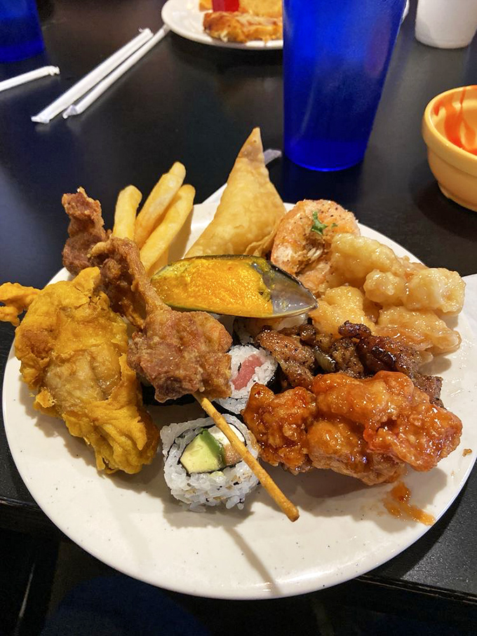 The buffet spread that launched a thousand return trips. Each tray a new opportunity for delicious discovery.