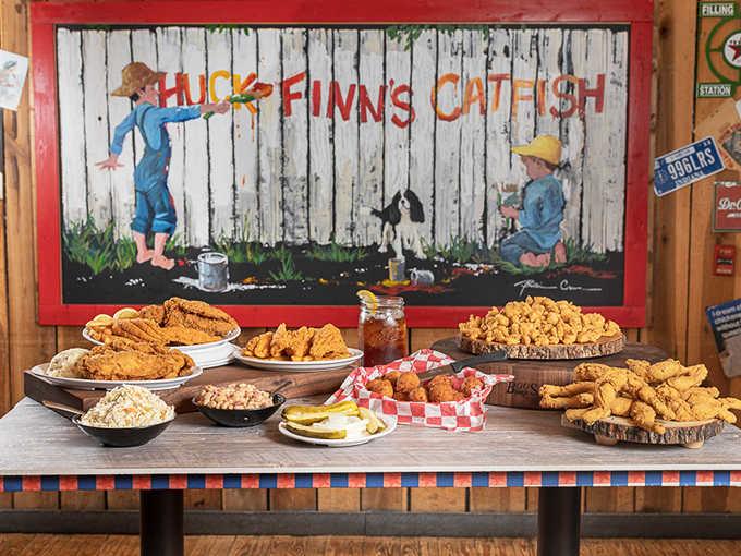 A feast fit for Huck himself&mdash;a spread of Southern classics arranged before the restaurant's namesake mural, promising delicious adventures without having to raft down a river.