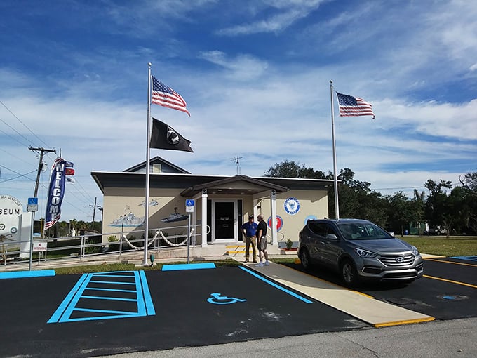 The Military Sea Services Museum stands proudly with flags unfurled, preserving stories of service while welcoming visitors with small-town hospitality.