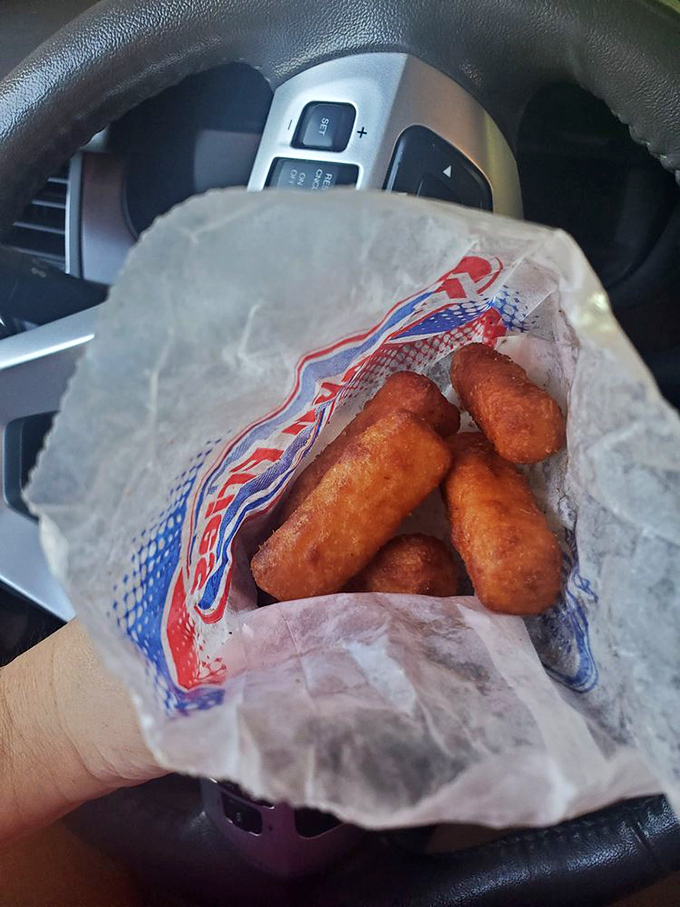 These aren't just mozzarella sticks; they're happiness cylinders. Crispy on the outside, molten cheese paradise on the inside&mdash;a perfect equation for joy.