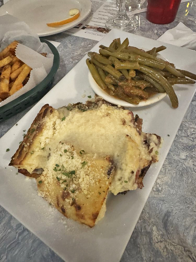 Moussaka that's traveled across oceans but feels right at home in Virginia &ndash; layers of flavor topped with a bechamel cloud.