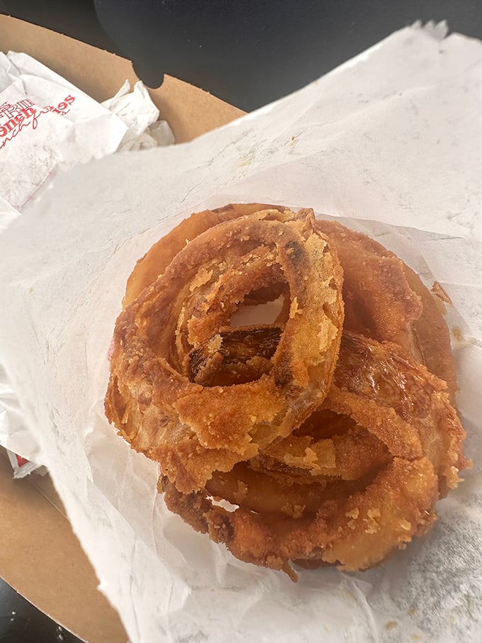 These aren't just onion rings&mdash;they're golden halos of happiness. Crispy, substantial, and demanding to be dunked in ketchup between bites.