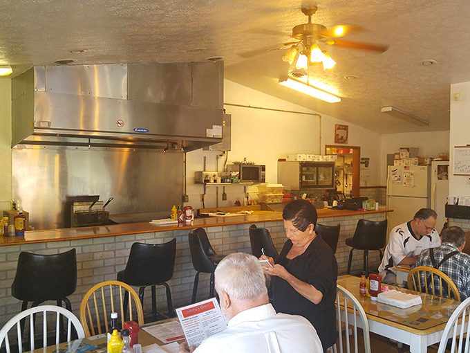The open kitchen concept wasn't invented by fancy restaurants&mdash;diners perfected it decades ago, making every meal dinner and a show.