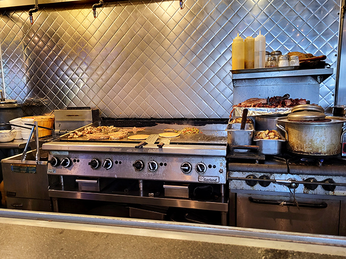 Behind the scenes magic: a hardworking grill that's seen more action than a Steelers defensive line, turning out plate after plate of diner perfection. 