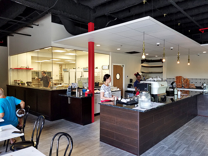 The open kitchen design lets you watch pastry wizardry in action &ndash; like peeking behind the curtain at a delicious magic show.