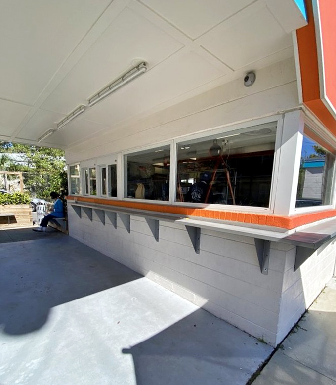 Clean lines, white paint, and that pop of orange&mdash;burger architecture that understands form follows function, especially for hungry customers.