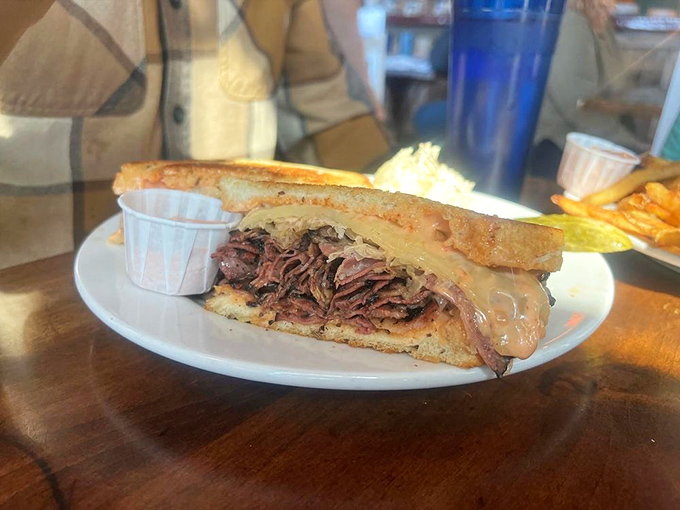 The Reuben&mdash;where pastrami, Swiss, and Russian dressing perform a perfectly choreographed dance on grilled rye. Pure sandwich poetry.