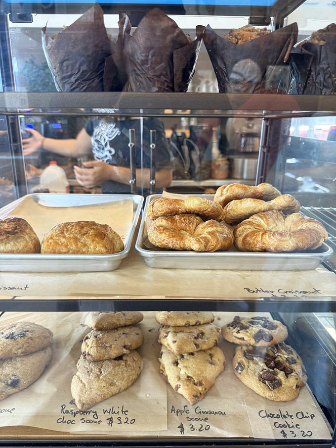 The glass case of temptation where willpower goes to die. Flaky croissants and cookies waiting to make your day exponentially better.