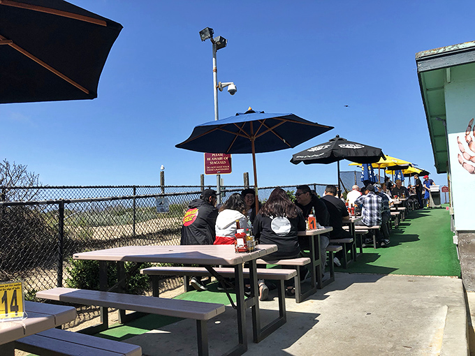 Outdoor dining with ocean breezes and the promise of seafood. Those umbrellas aren't just for shade&mdash;they're signaling "party over here!"